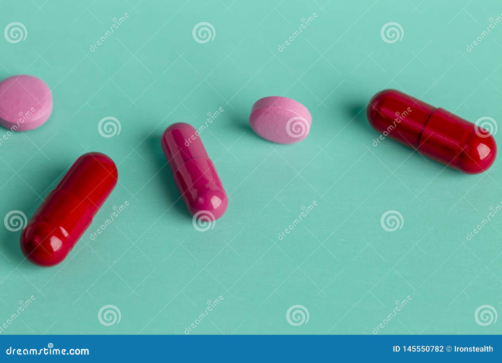 Red and Pink Medicinal Tablets and Capsules Stock Photo - Image of ...