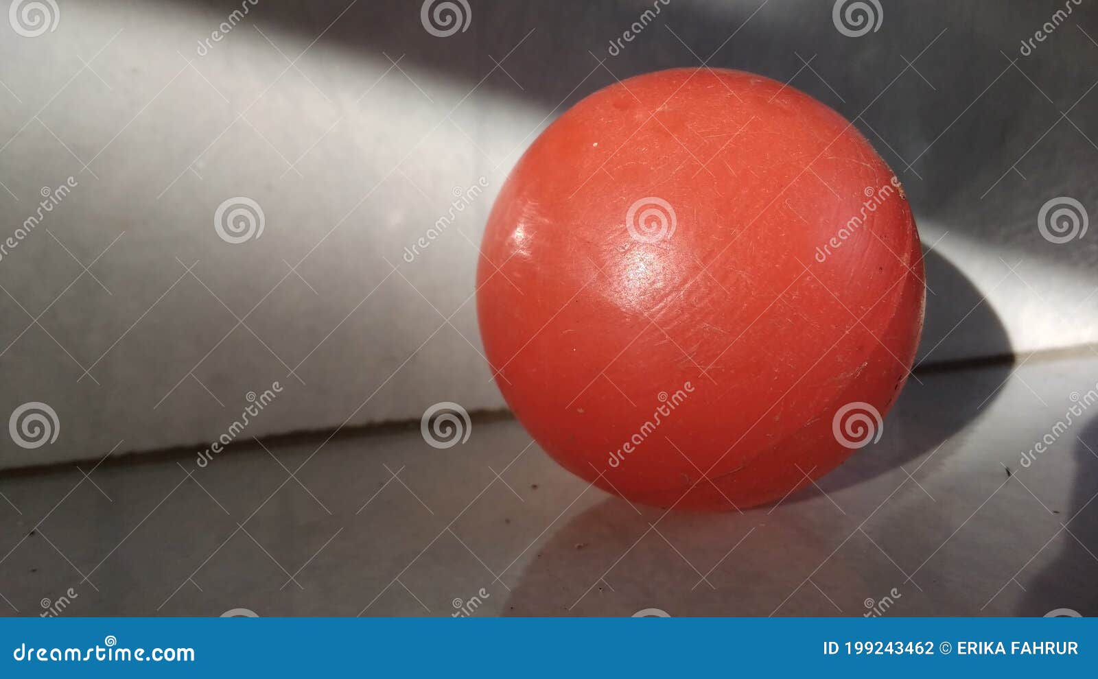 The Red Plastic Ball on the Floor Where Children Played Stock Photo ...