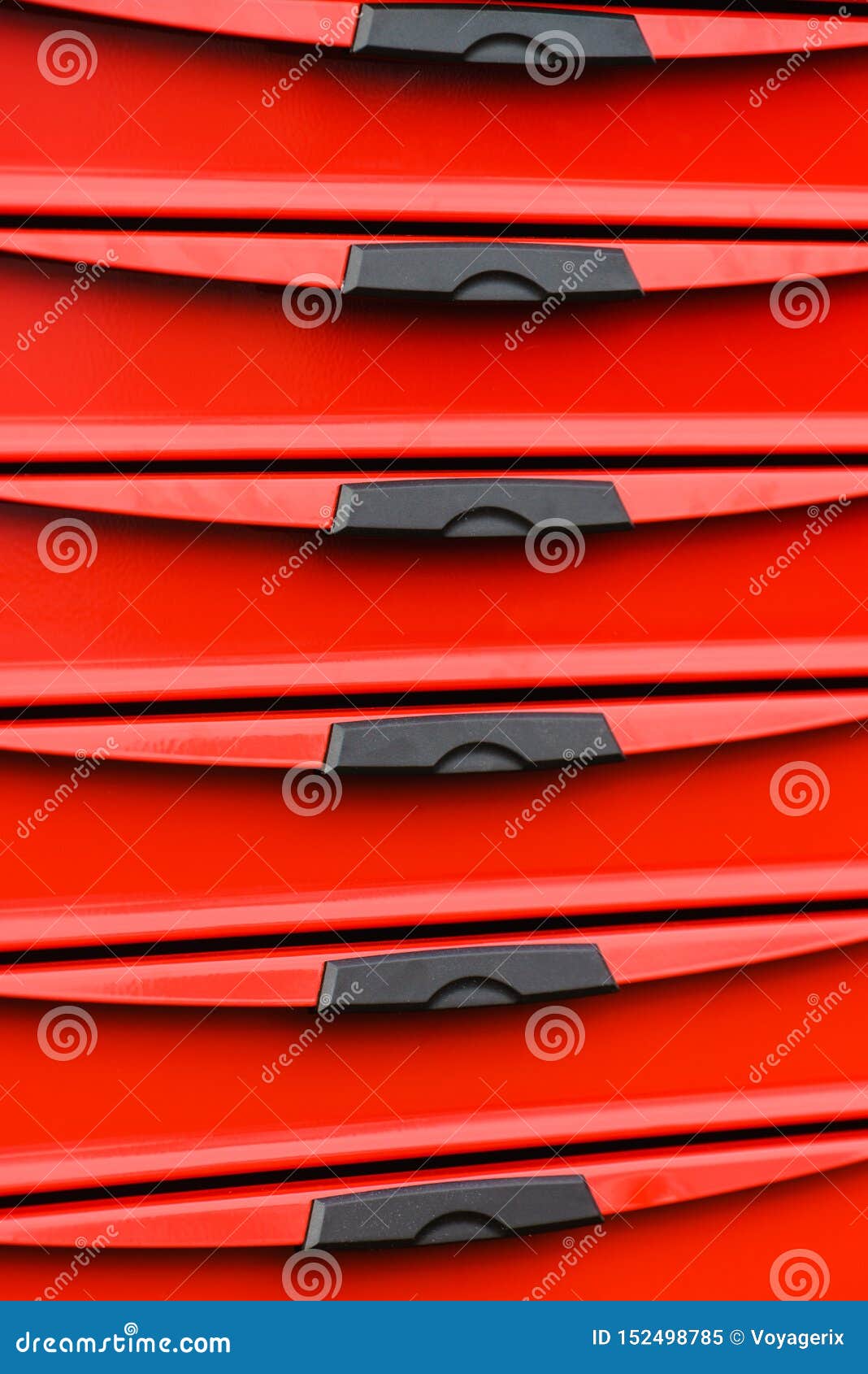 Red Plastic Box Cabinet with Black Handles Drawers Stock Image - Image ...