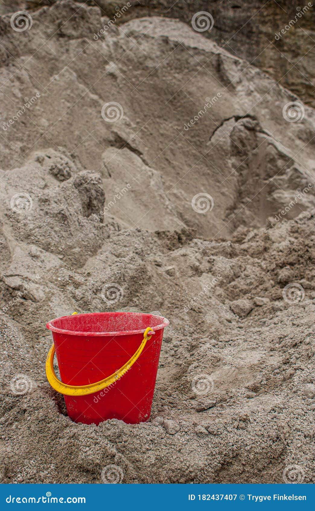 Red Plastic Bucket in a Big Pile of Sand Stock Image - Image of ...