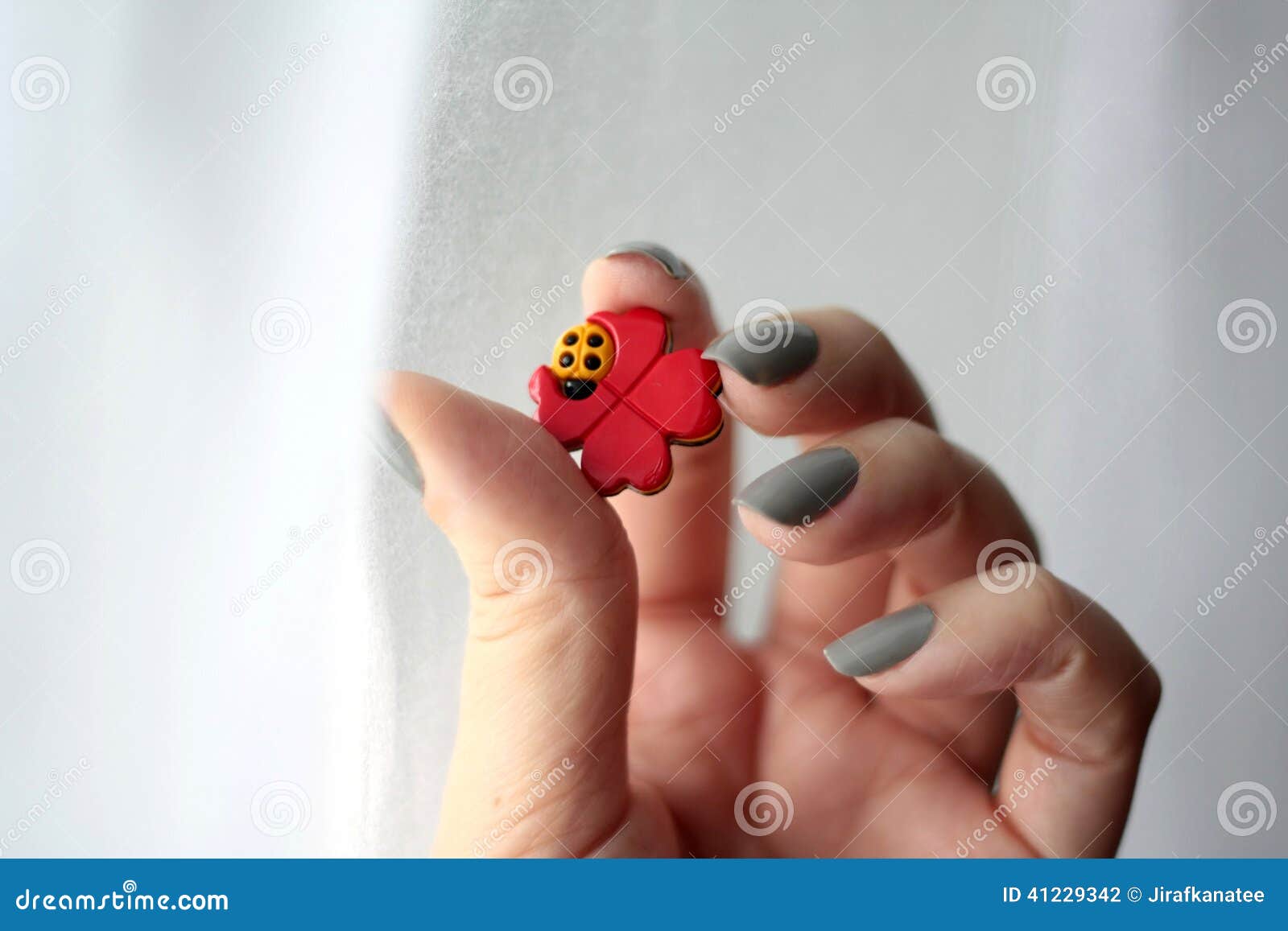 Red plastic clover leaf stock photo. Image of trefoil - 41229342