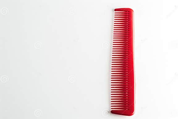 A Red Plastic Comb Isolated on a White Background Stock Photo - Image ...