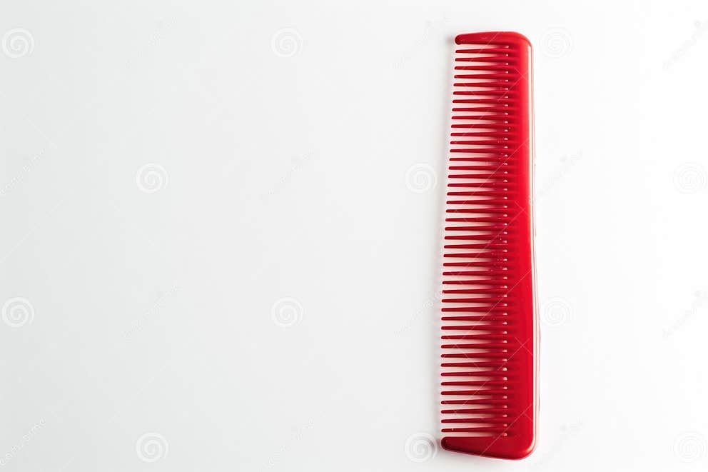 A Red Plastic Comb Isolated on a White Background Stock Photo - Image ...
