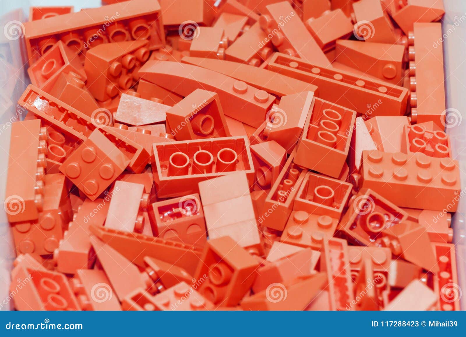 Red Plastic Construction Block Designer. Background of Bright Plastic ...