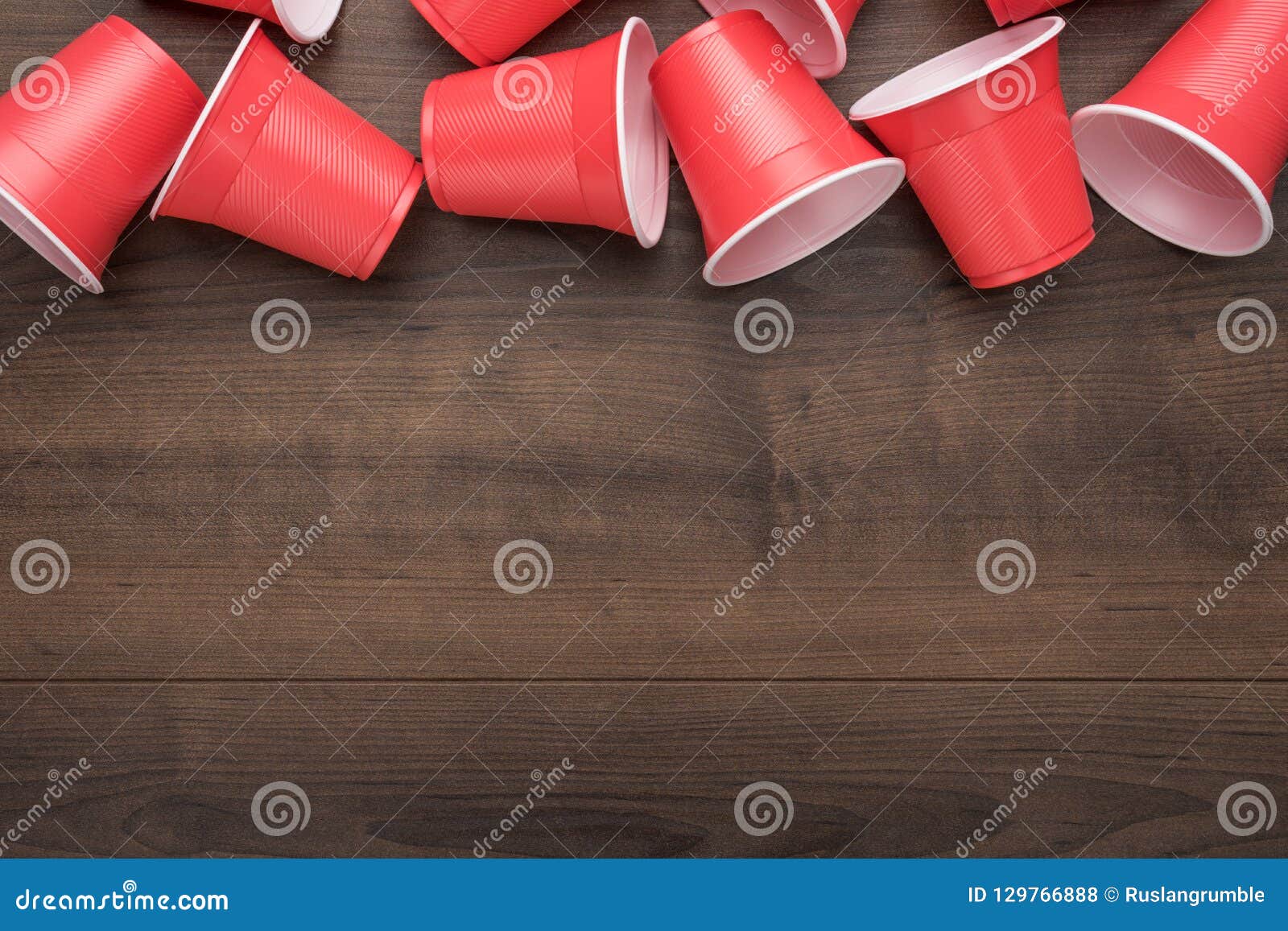 Disposable Plastic Cups on the Wooden Background. Top View of Used ...