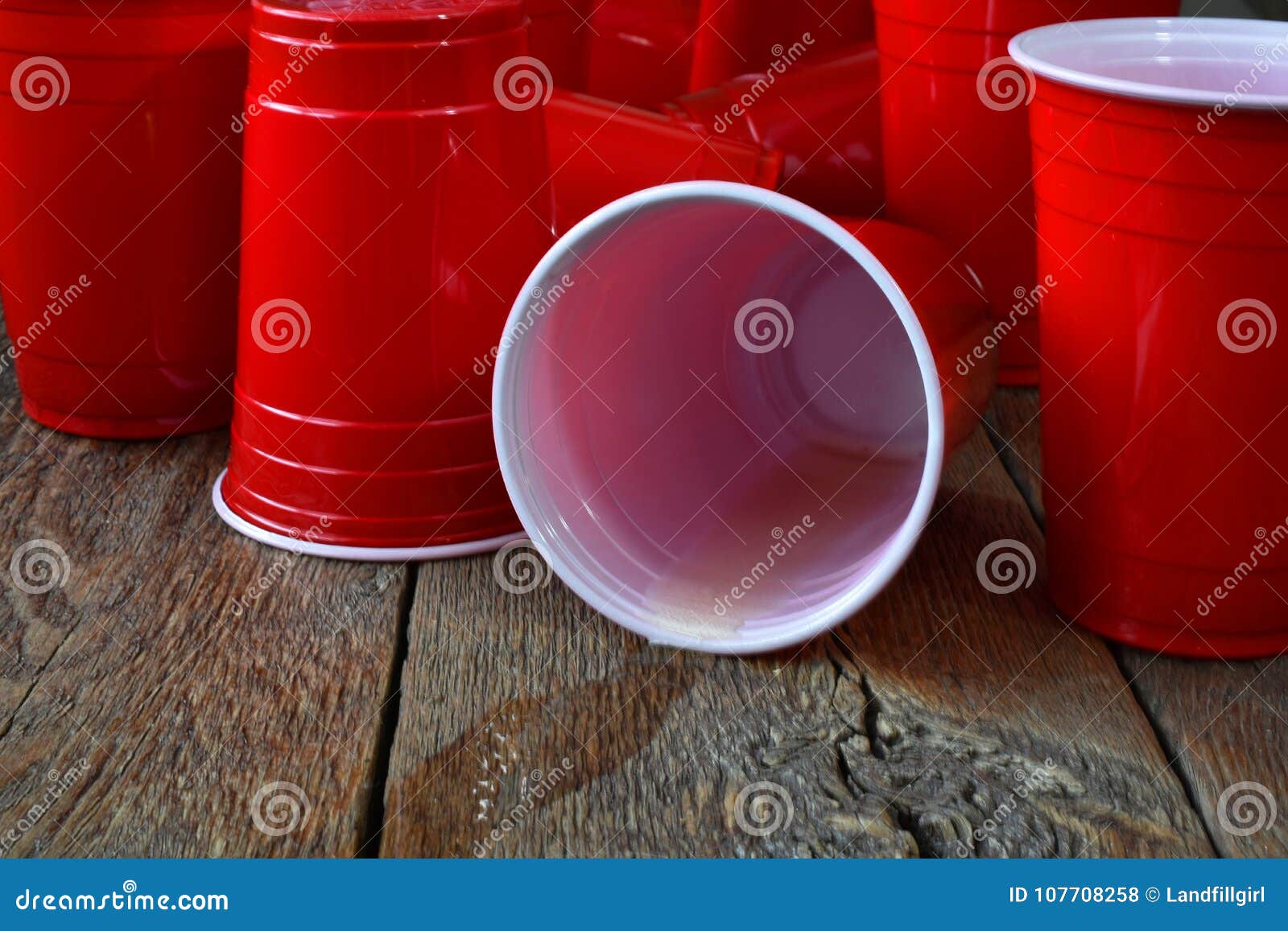 Red Plastic Drinking Cups and Spilled Beer Stock Photo - Image of ...