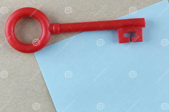 Red Plastic Key is Placed on Blue Paper Note. Stock Photo - Image of ...