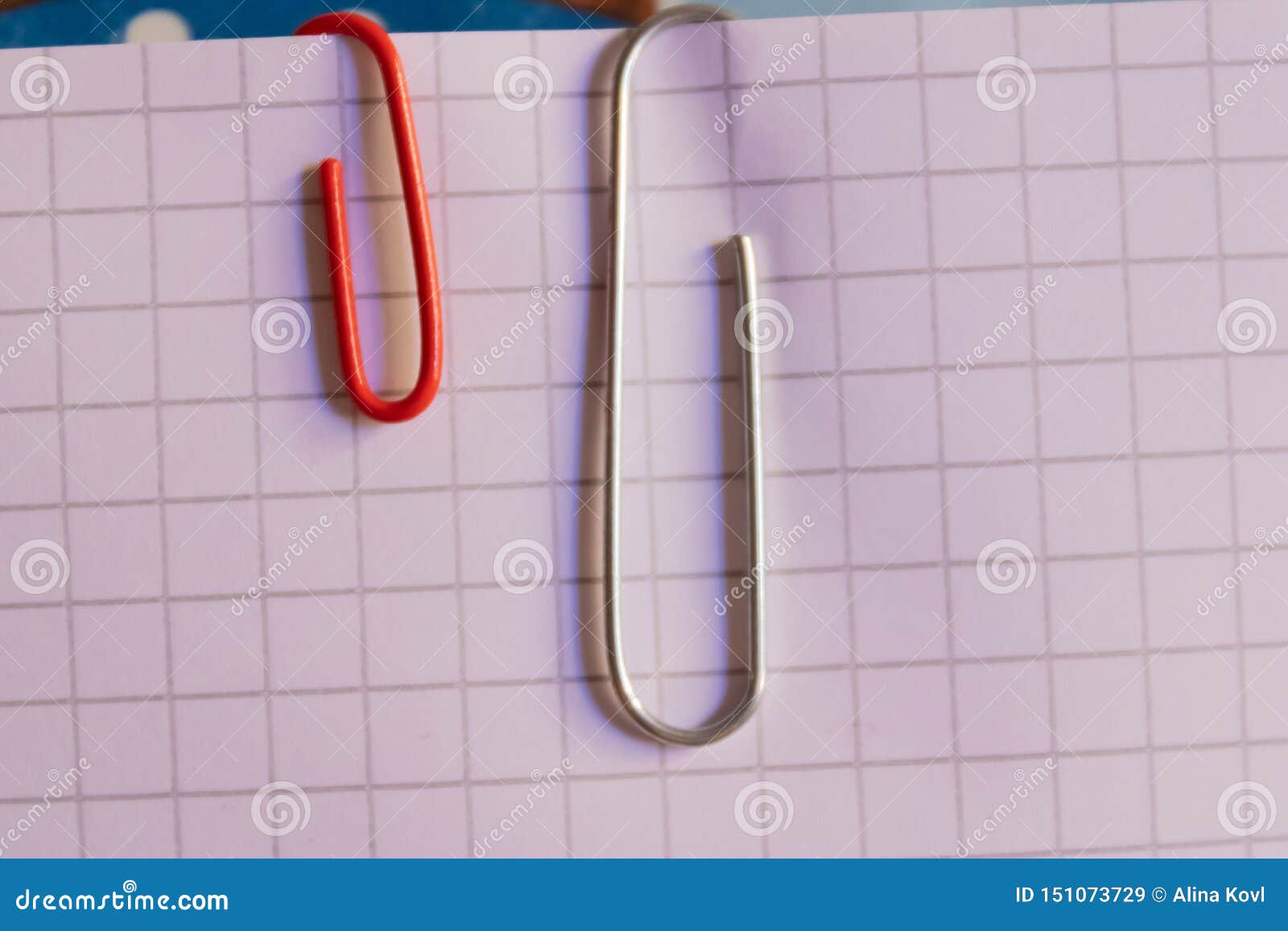Red Plastic and Metal Paper Clips on Notebook Page - Image Stock Image ...