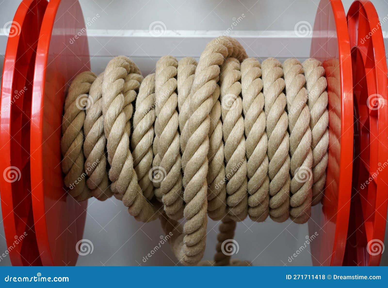 Red Plastic Reel with Thick Cotton Rope Wound on it Stock Photo - Image ...