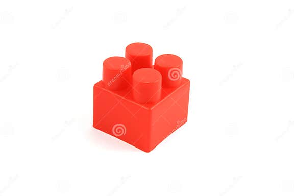 Red plastic toy brick stock photo. Image of baby, public - 6988592