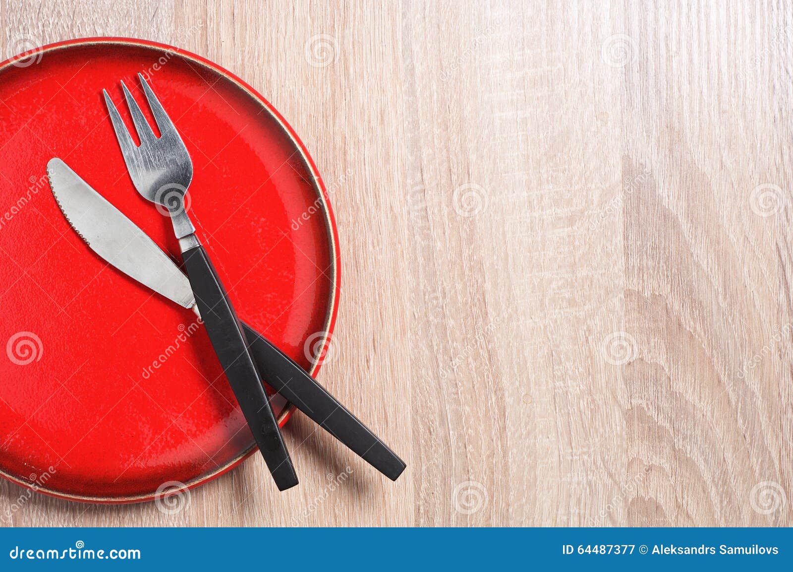 Red plate, fork and knife stock image. Image of empty - 64487377