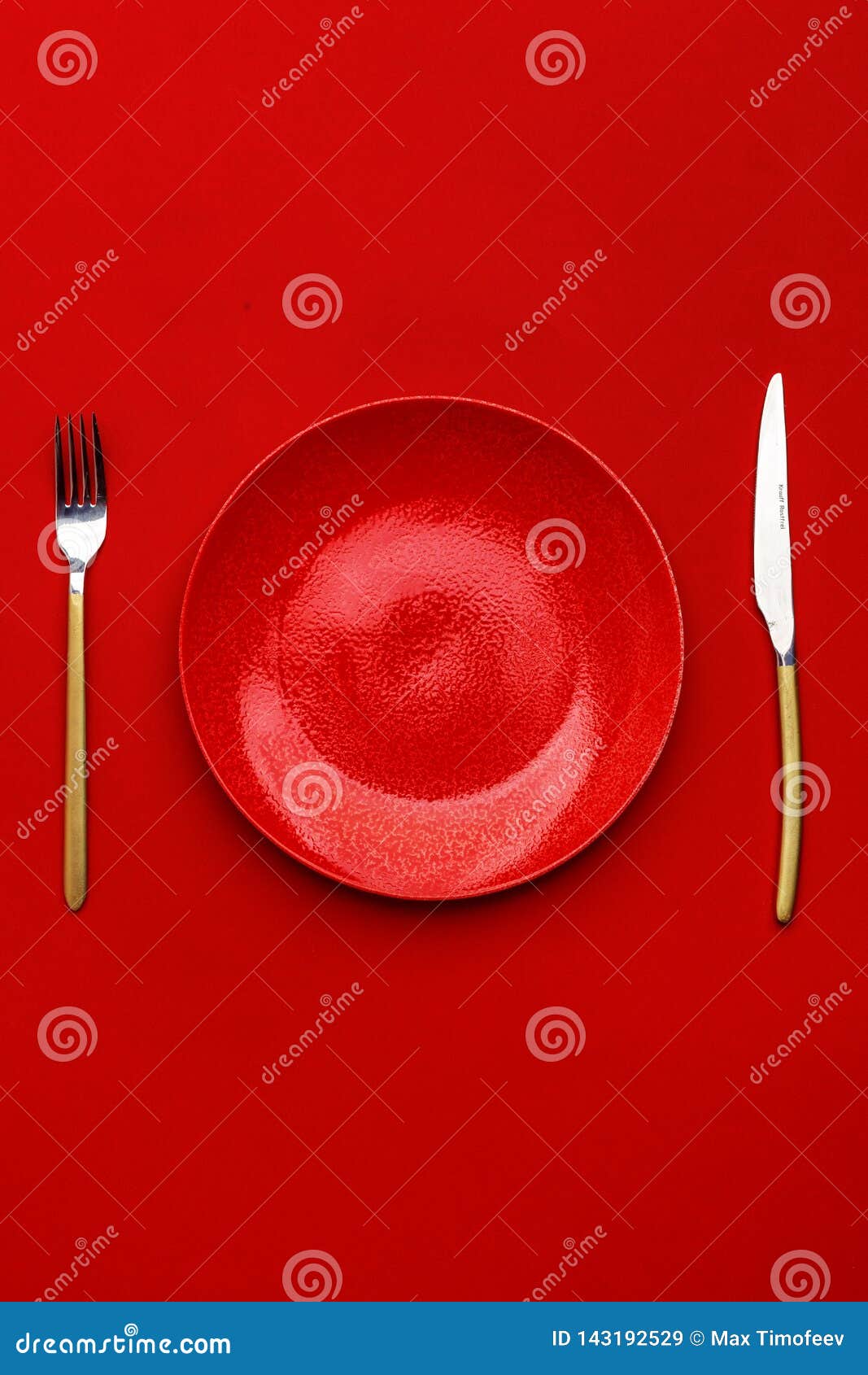 Red Plate, Knife and Fork on a Red Table. Top View Stock Image - Image ...