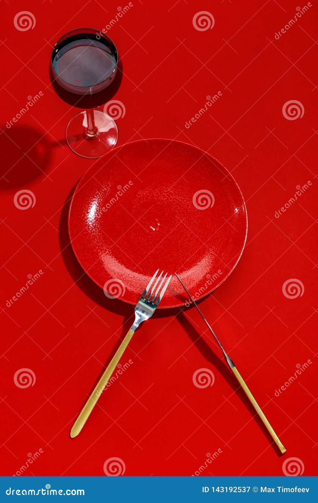 Red Plate, Knife and Fork on a Red Table. Top View Stock Image - Image ...
