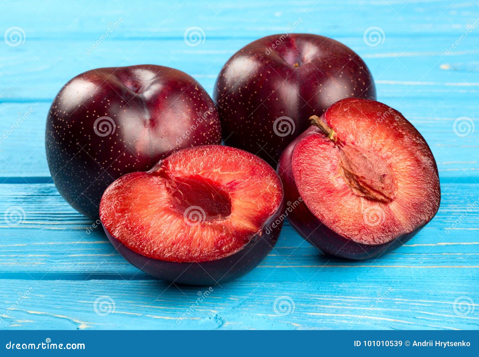 Red plum with half stock image. Image of culture, juicy - 101010539