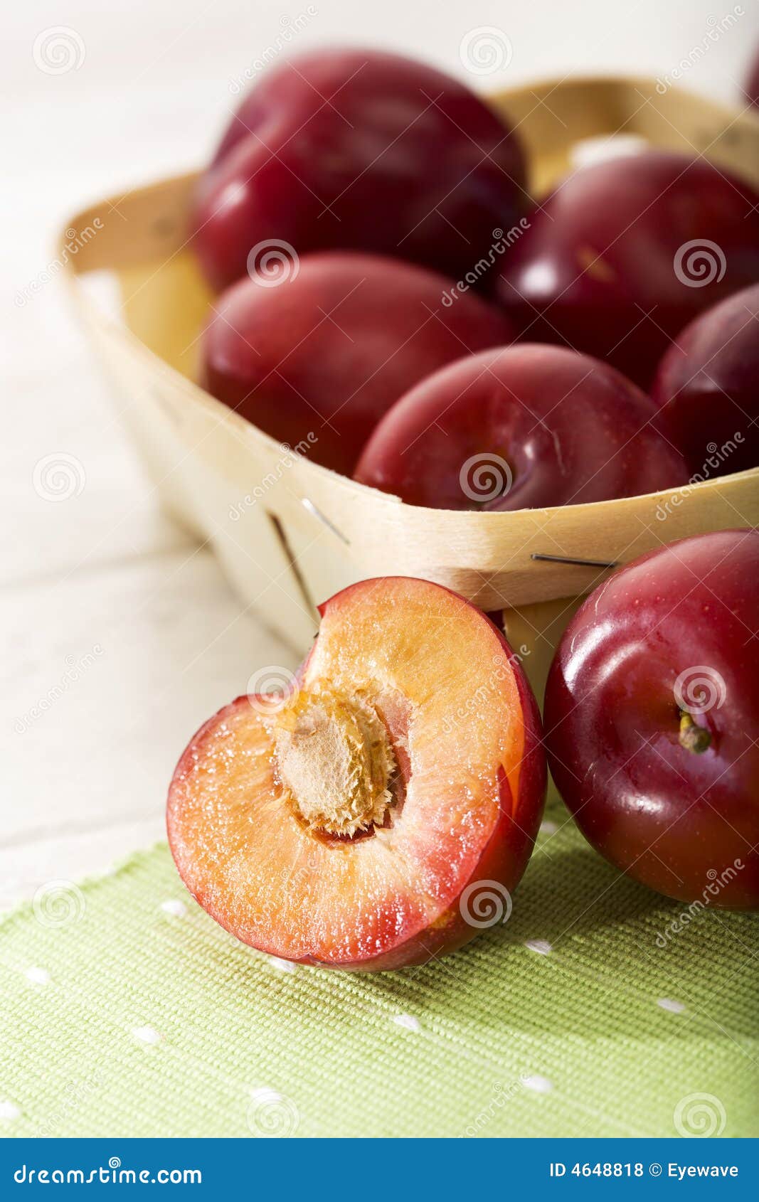 Red plums close-up stock photo. Image of core, fall, sunlight - 4648818