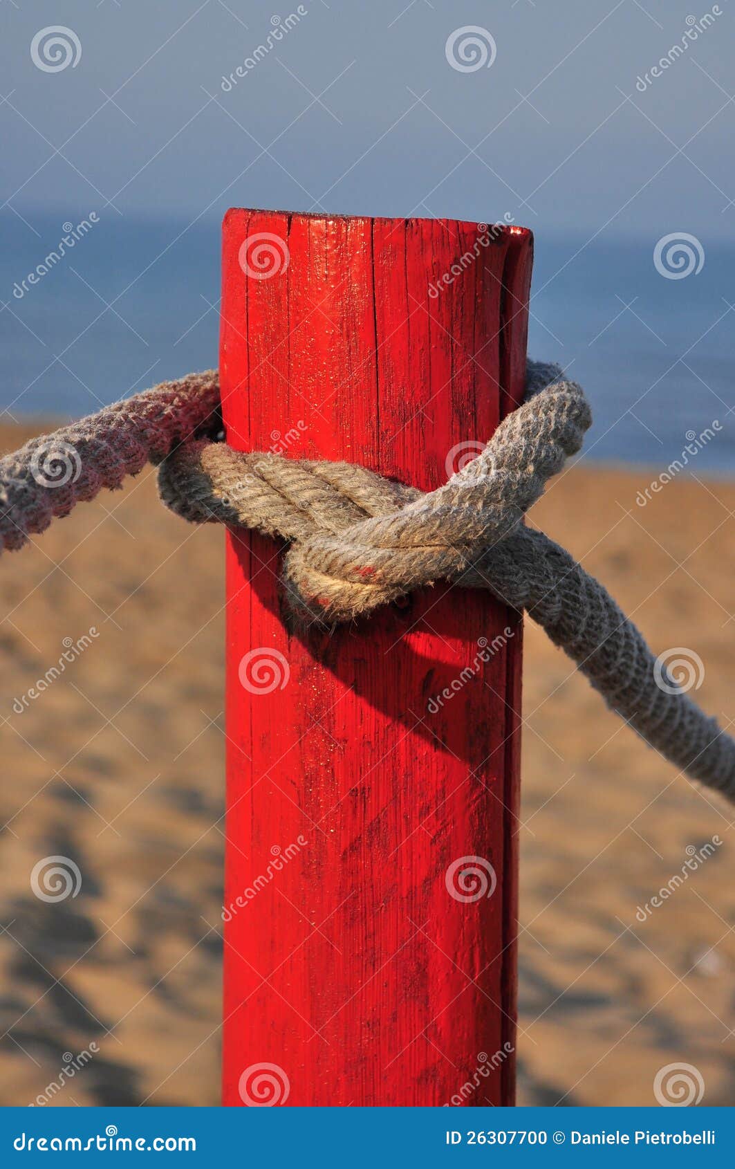 Red pole on the beach stock photo. Image of sailor, beach - 26307700