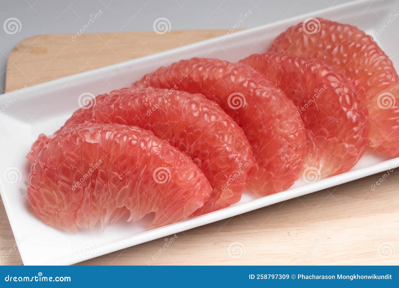Red Pomelo or Grapefruit on a Wooden Floor Stock Image - Image of ...