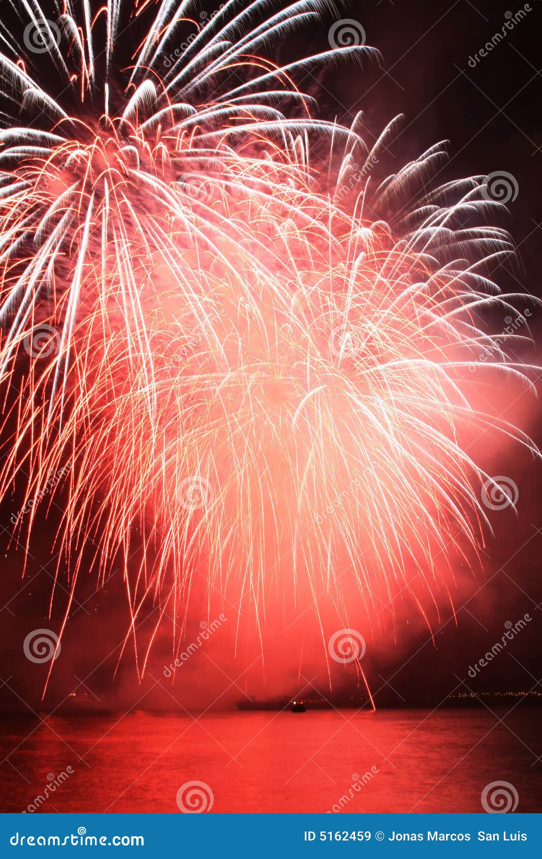 Red pompom fireworks stock image. Image of water, colorful - 5162459