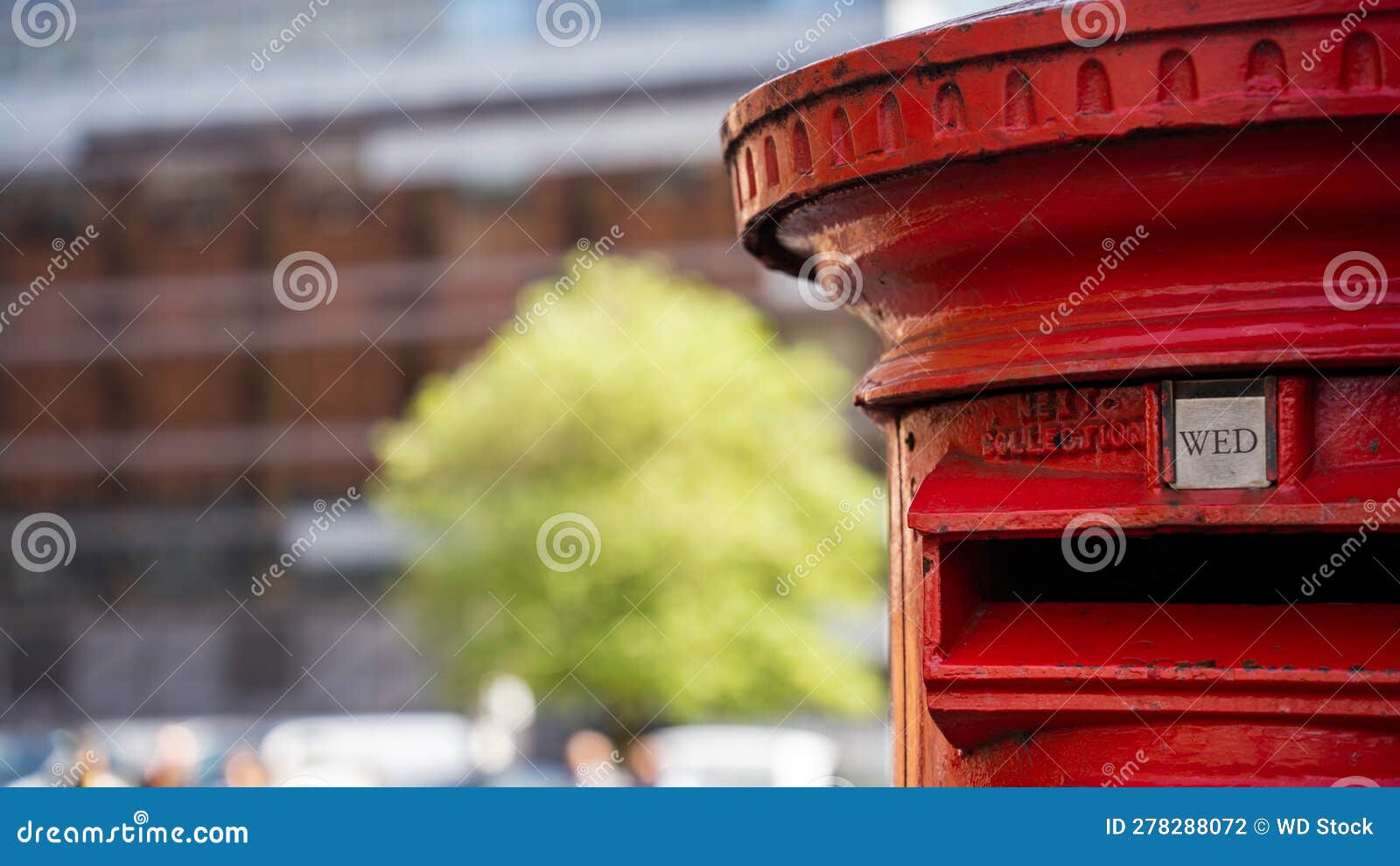Red Post Box in a City Setting Stock Photo - Image of glass, sign ...