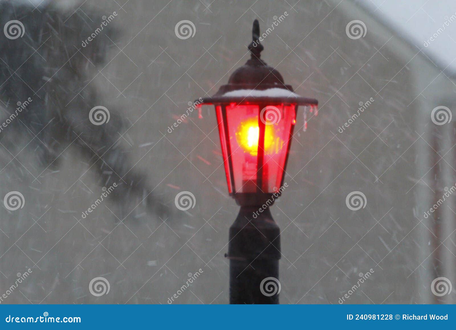Red Post Light Shining during a Winter Storm Stock Photo - Image of ...