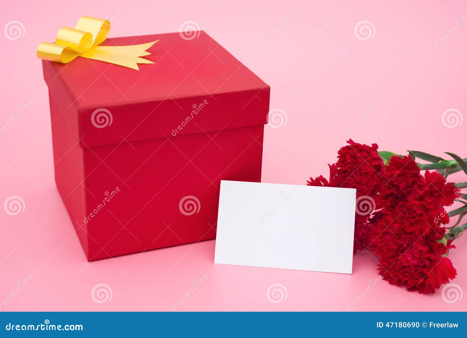 Red Present Box and Red Carnations with a Blank Card Stock Photo ...