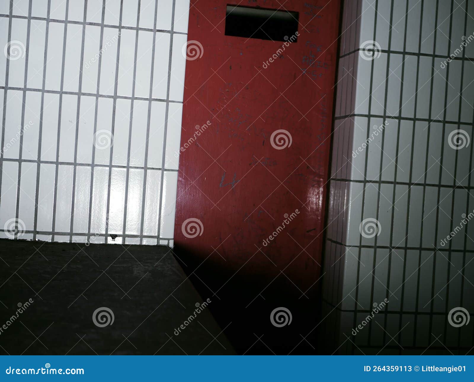 Red Prison Door Closed in White Tile Prison Cell Medium Shot Stock ...