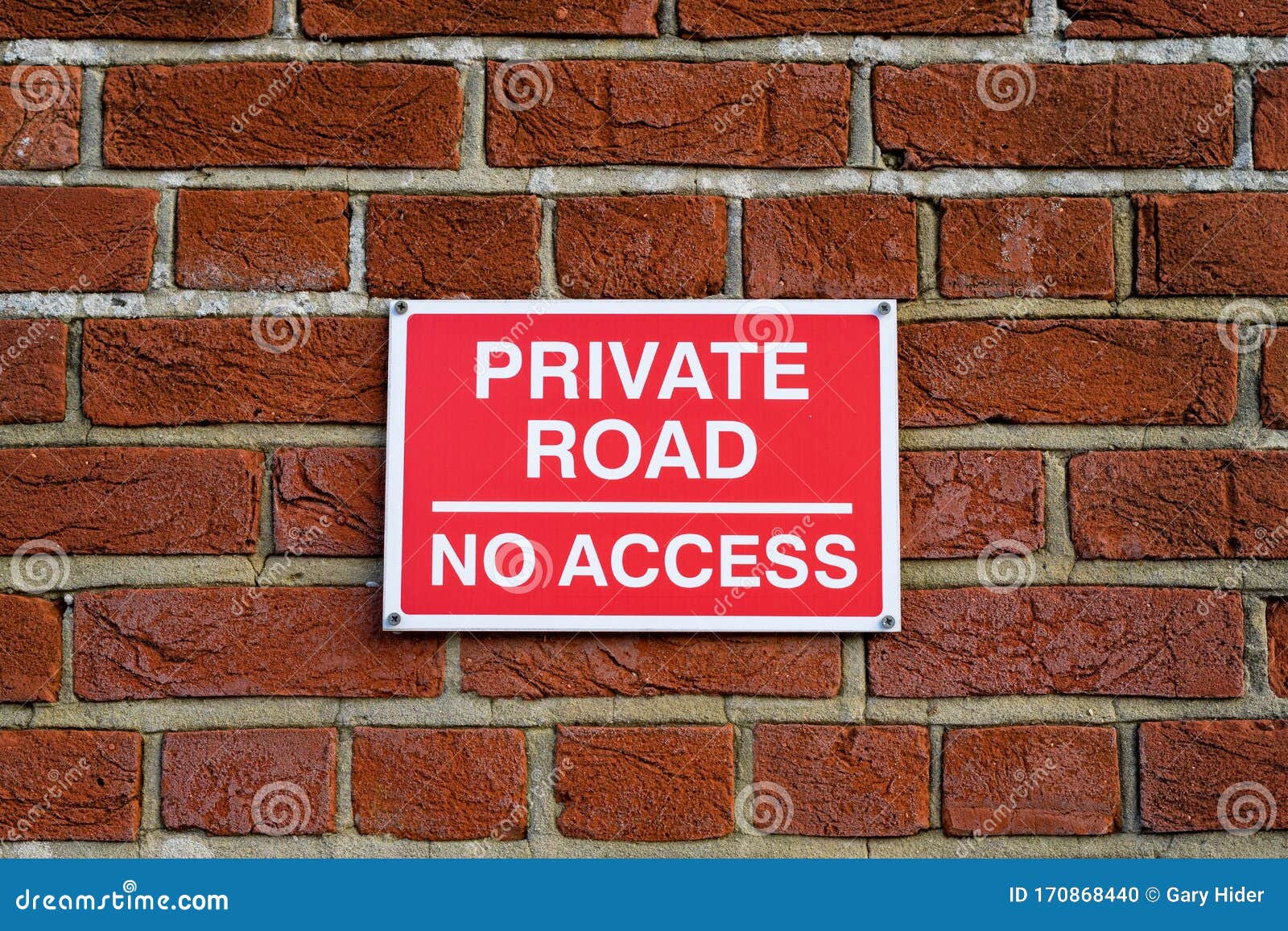 A Red Private Road No Access Sign on a Brick Wall Stock Photo - Image ...