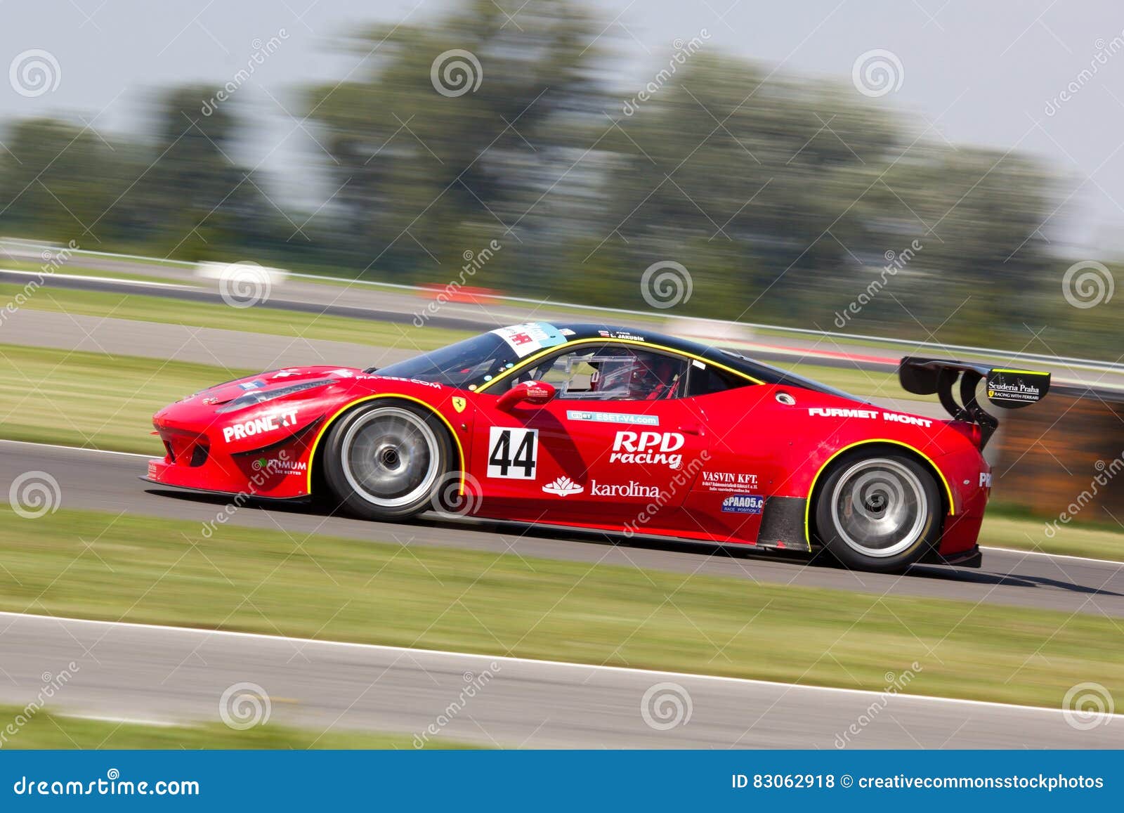 Red Racing Car On Race Track During Daytime Picture. Image: 83062918