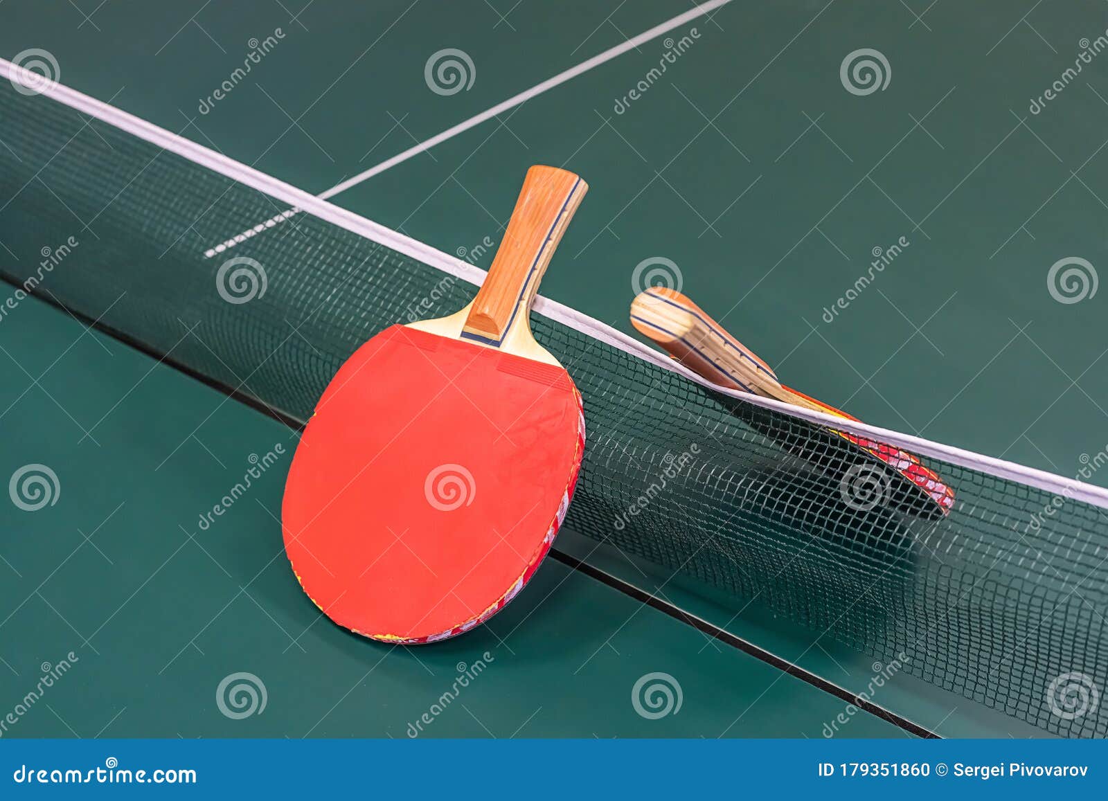 Red Racket for Playing Ping Pong on the Background of the Separation ...