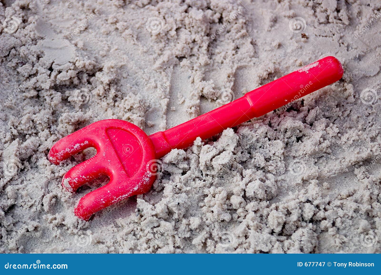 Red Rake in the Sand stock image. Image of long, rake, outdoor - 677747