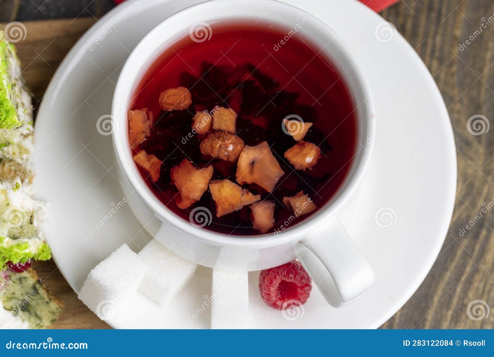 Red Raspberry Tea with Pieces of Fruit and Berries Stock Photo - Image ...