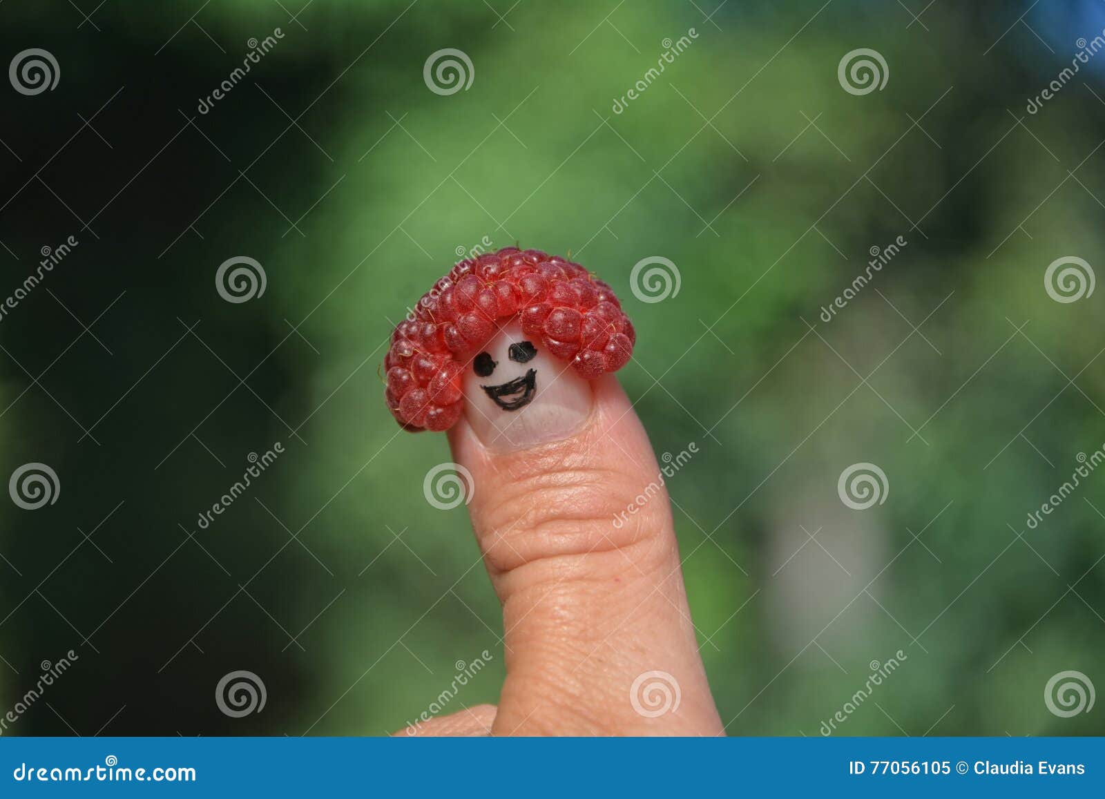 Red Raspberry on the Thumb with a Smiling Face Stock Image - Image of ...
