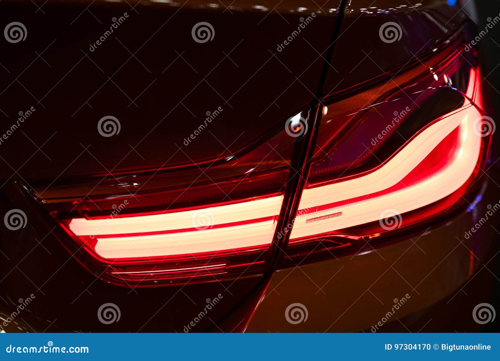 Red Rear Light on a Modern Red Car with Reflection. the Closeup Stock ...