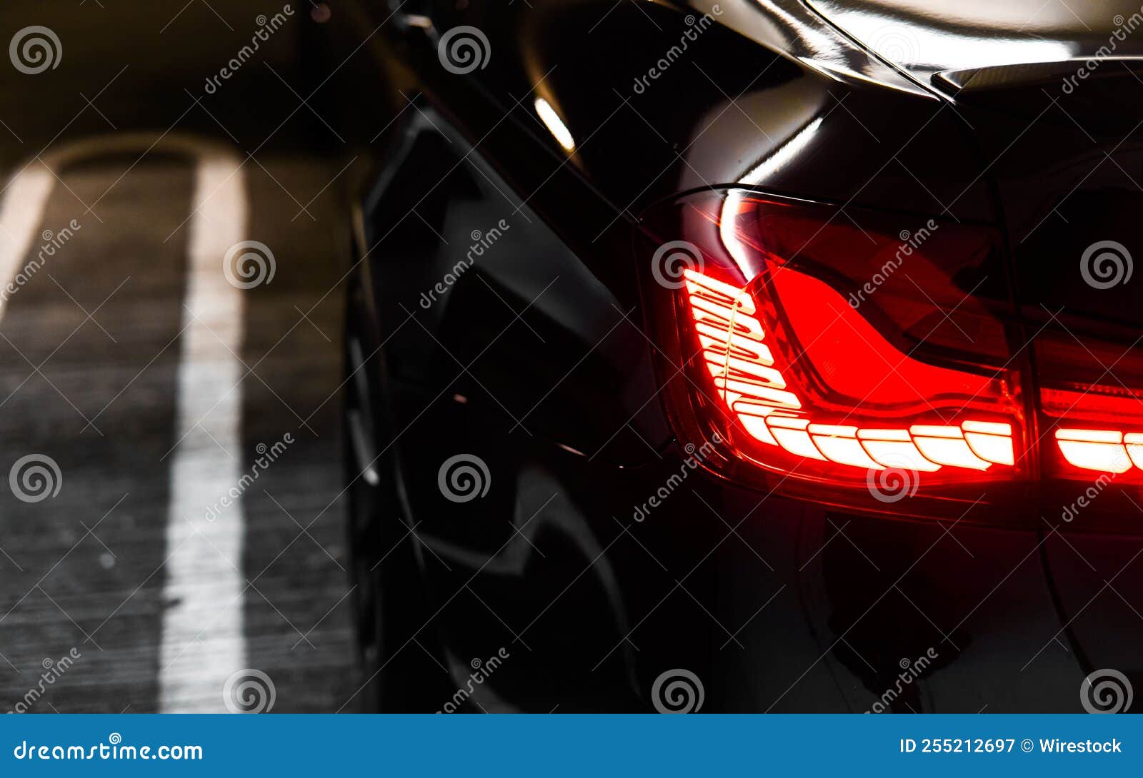 Red Rear Lights of a Black Car on the Street Stock Image - Image of ...