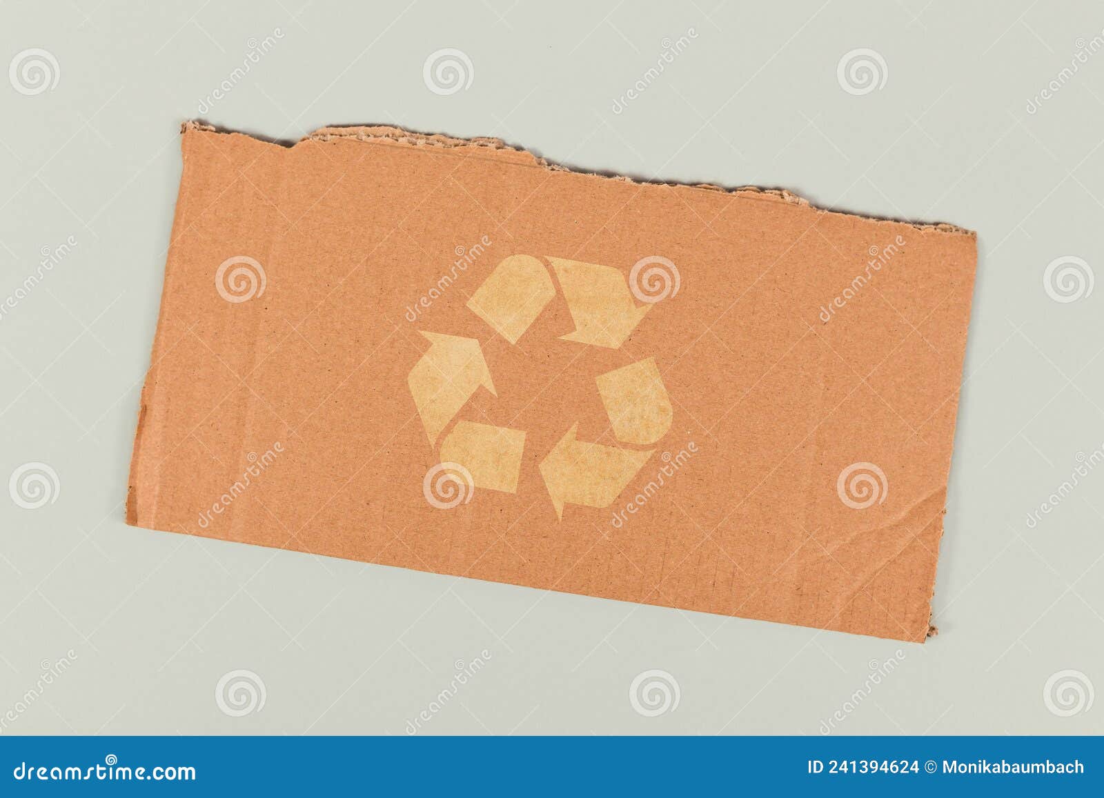 Recycling Arrow Symbol on Piece of Cardboard Stock Photo - Image of ...