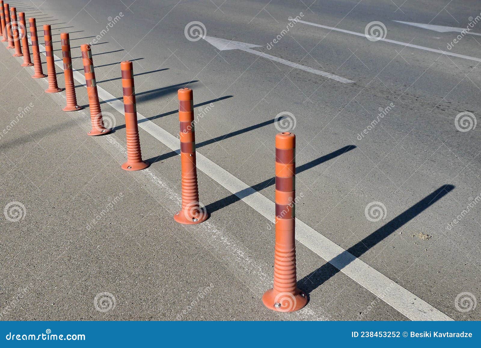 Regulation Poles with Hard Shadows Stock Photo - Image of urban ...