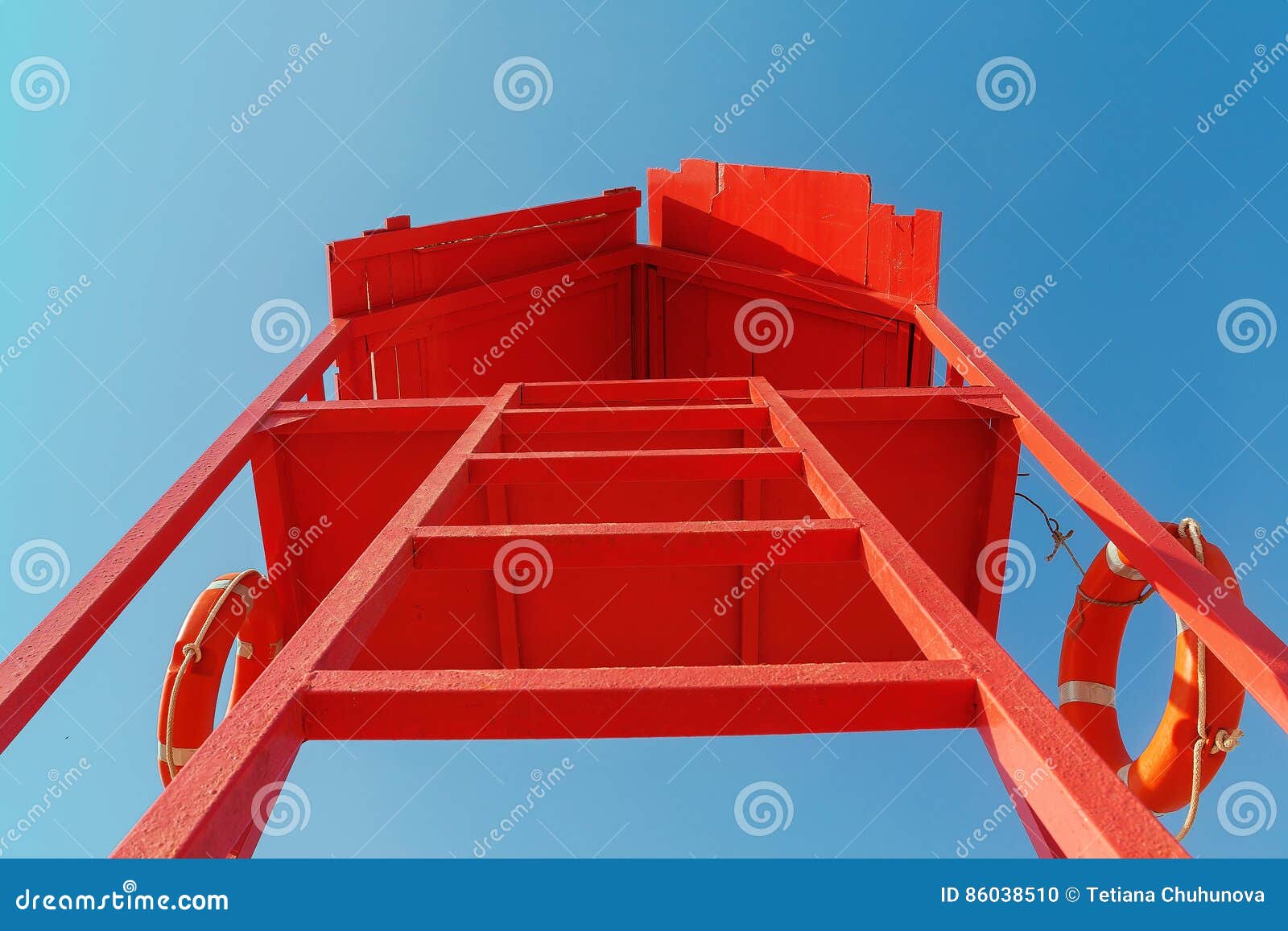 Red Rescue Tower with a Lifeline Against the Blue Sky Stock Photo ...