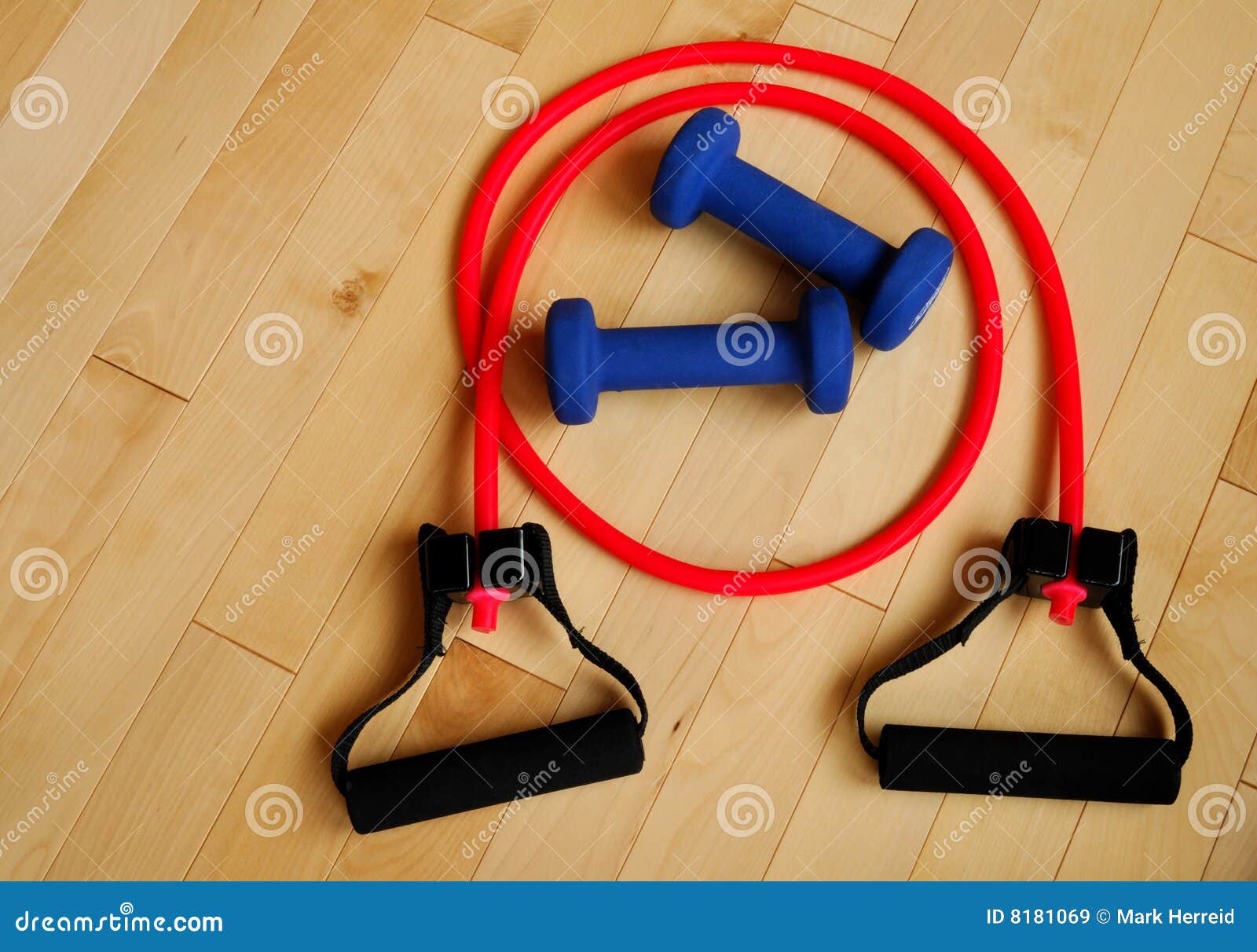 Red Resistance Band and Blue Weights on Gym Floor Stock Image - Image ...