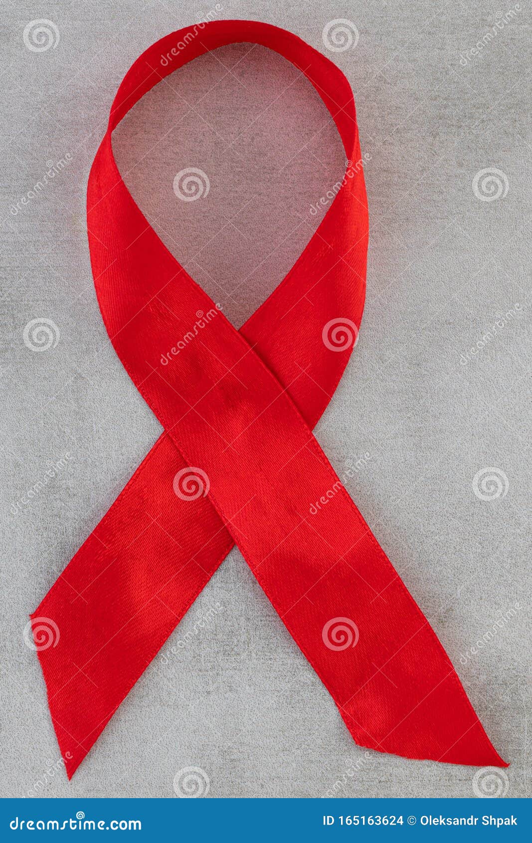 Red Ribbon - AIDS Awareness Symbol on the Gray Background with Copy ...