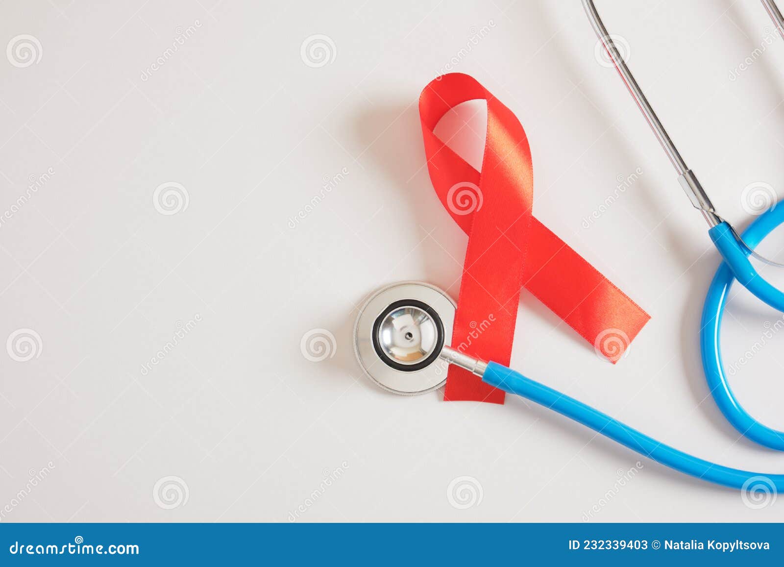 Red Ribbon And Blue Medical Stethoscope Healthcare And Safe Sex Concept