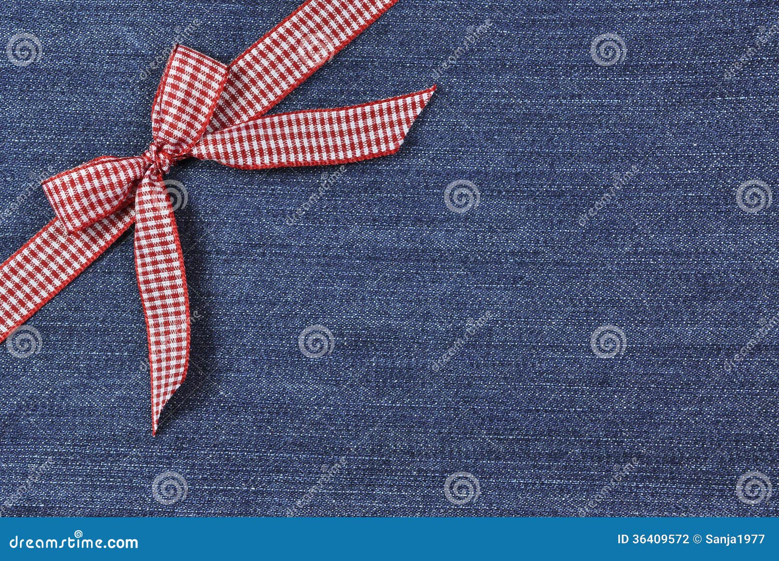 Red Ribbon on a Jeans Background Stock Photo - Image of compliment ...