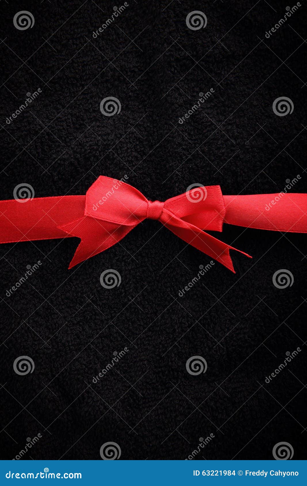 Red ribbon over black stock photo. Image of celebration - 63221984