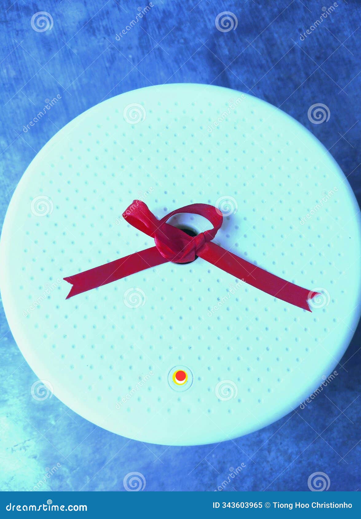 Red Ribbon on Round Surface with Blue Textured Background Stock Image ...