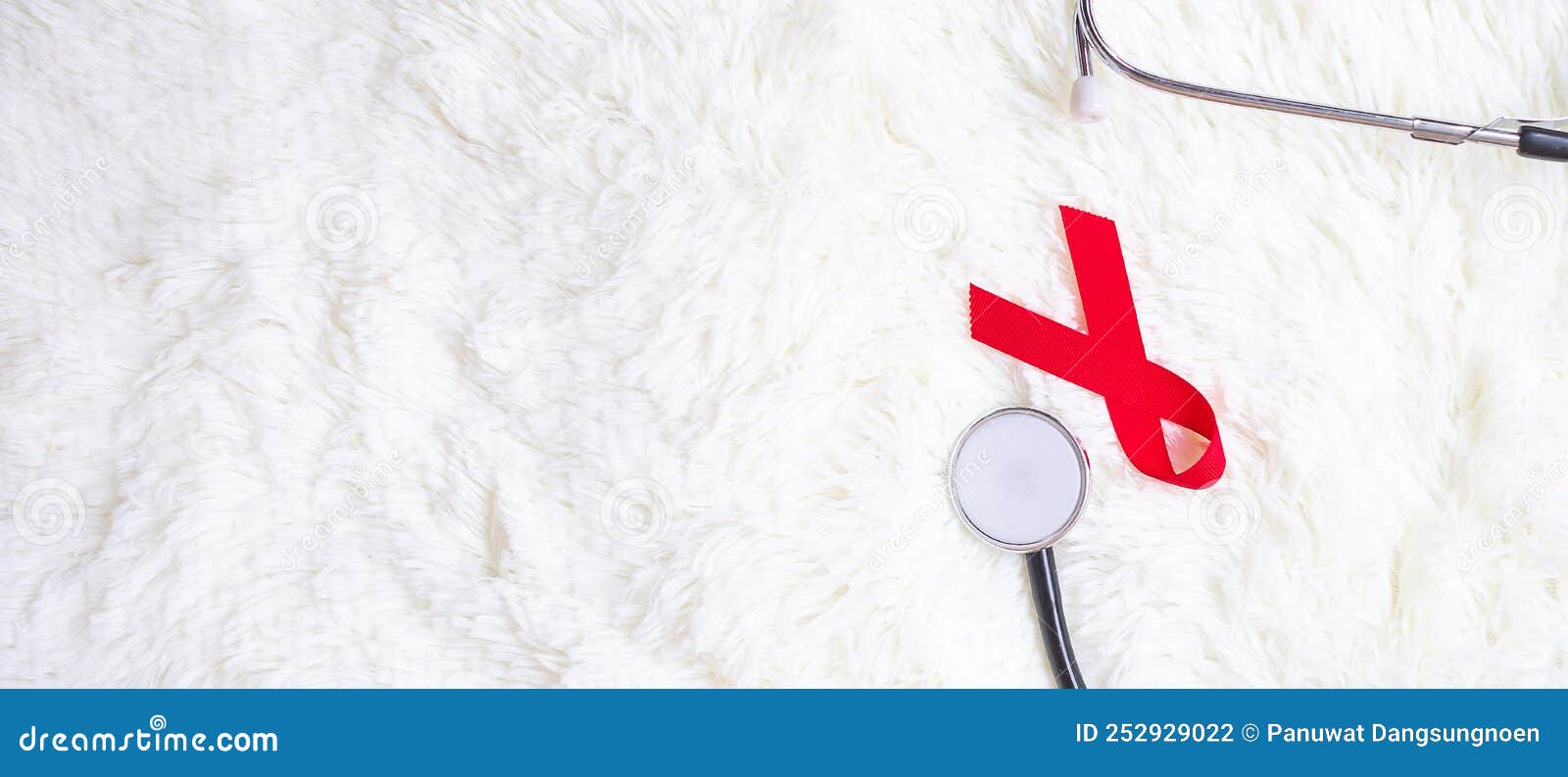 Red Ribbon With Stethoscope For Supporting People Living And Illness