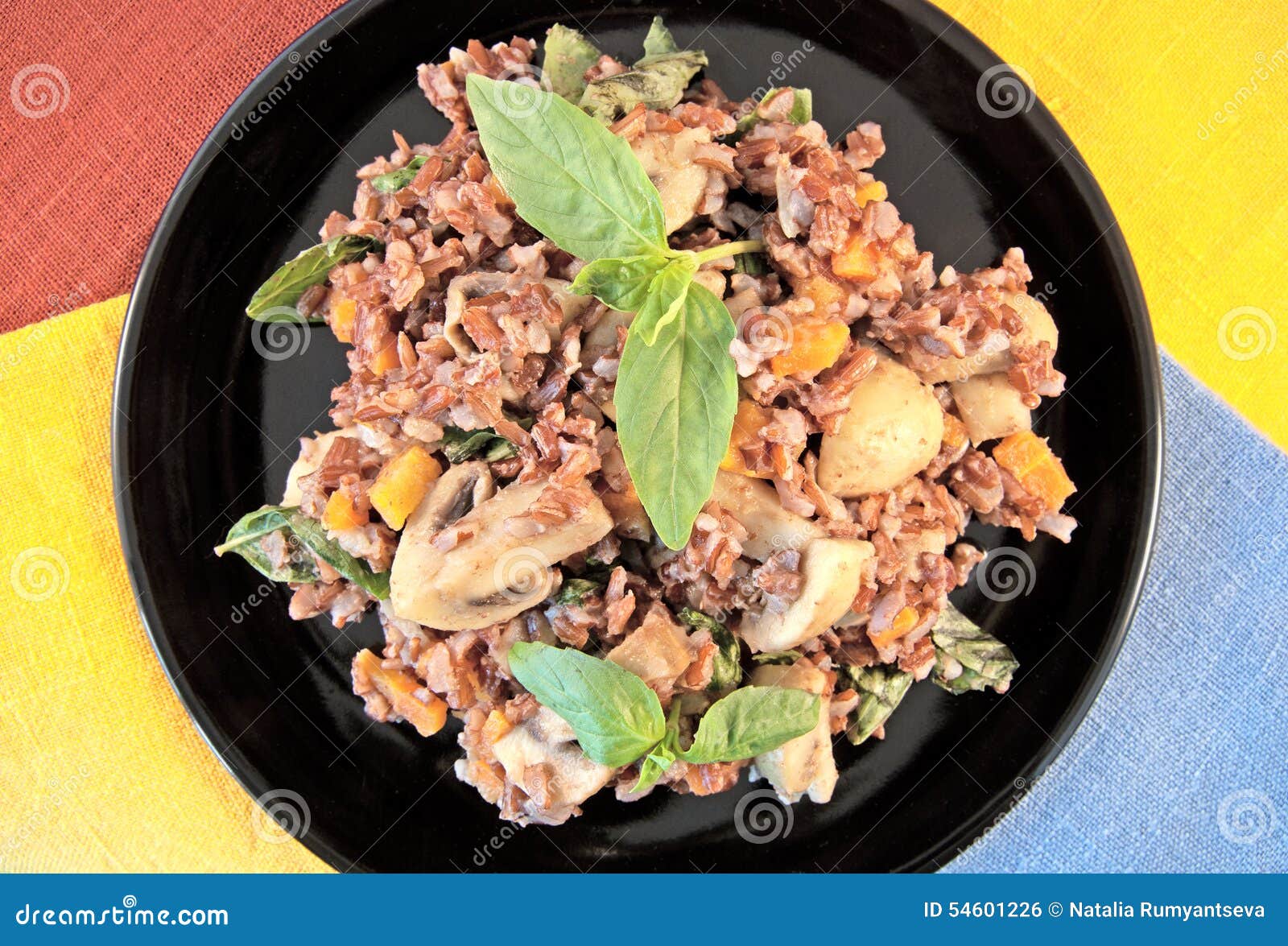 Red Rice with Mushrooms, Carrot and Basil Stock Photo - Image of ...