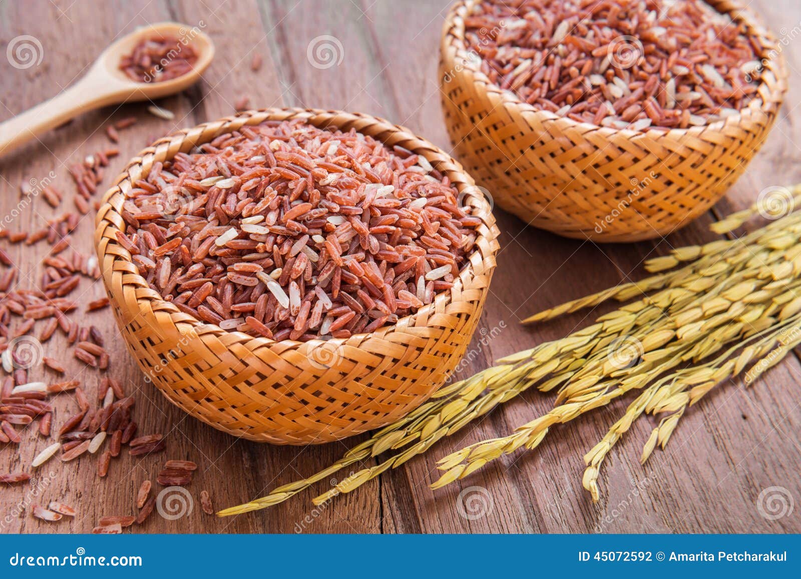 Red rice in wooden bowl stock photo. Image of cuisine - 45072592
