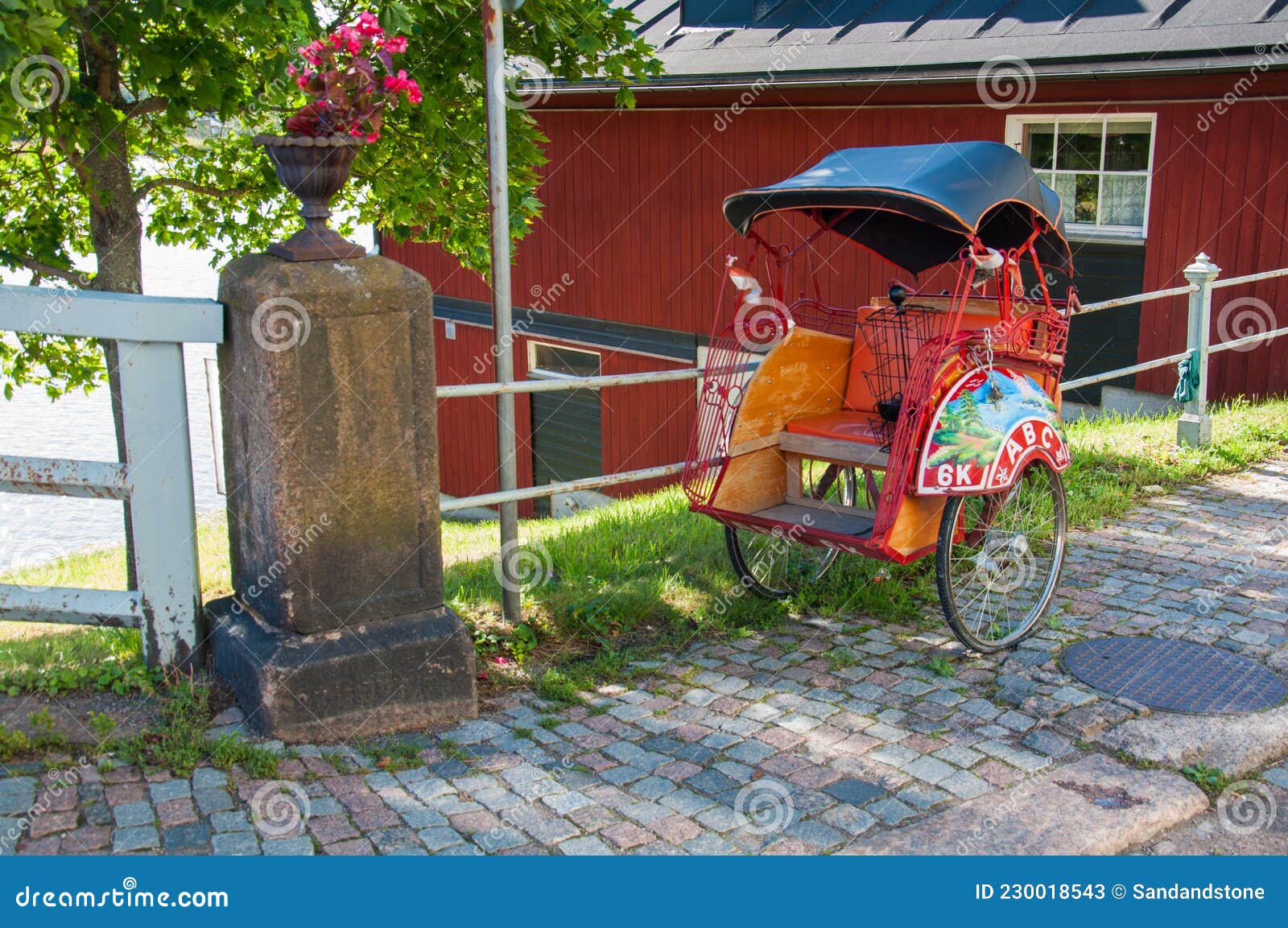 Red Rickshaw on a Background of Red Wooden Building Stock Image - Image ...