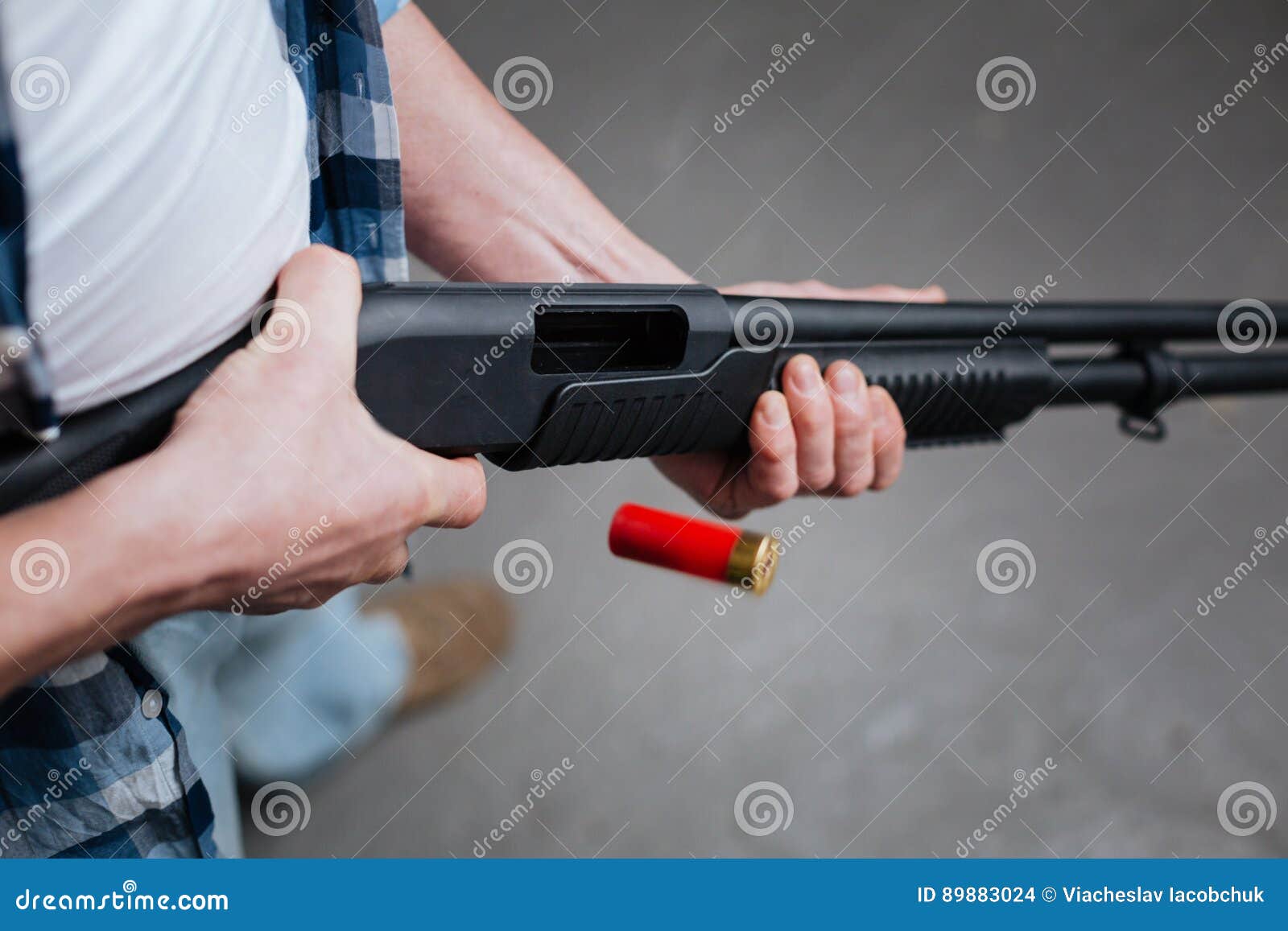 Red Riffle Bullet Dropping Out of the Gun Stock Photo - Image of ...