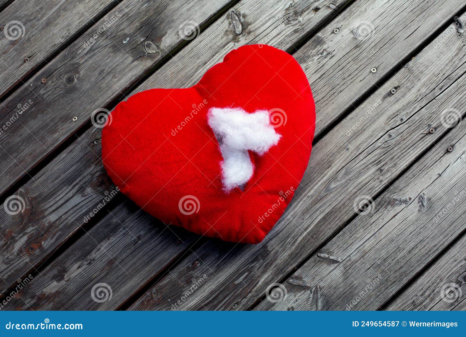 Ripped Stuffed Heart Lying on the Floor Stock Image - Image of injured ...