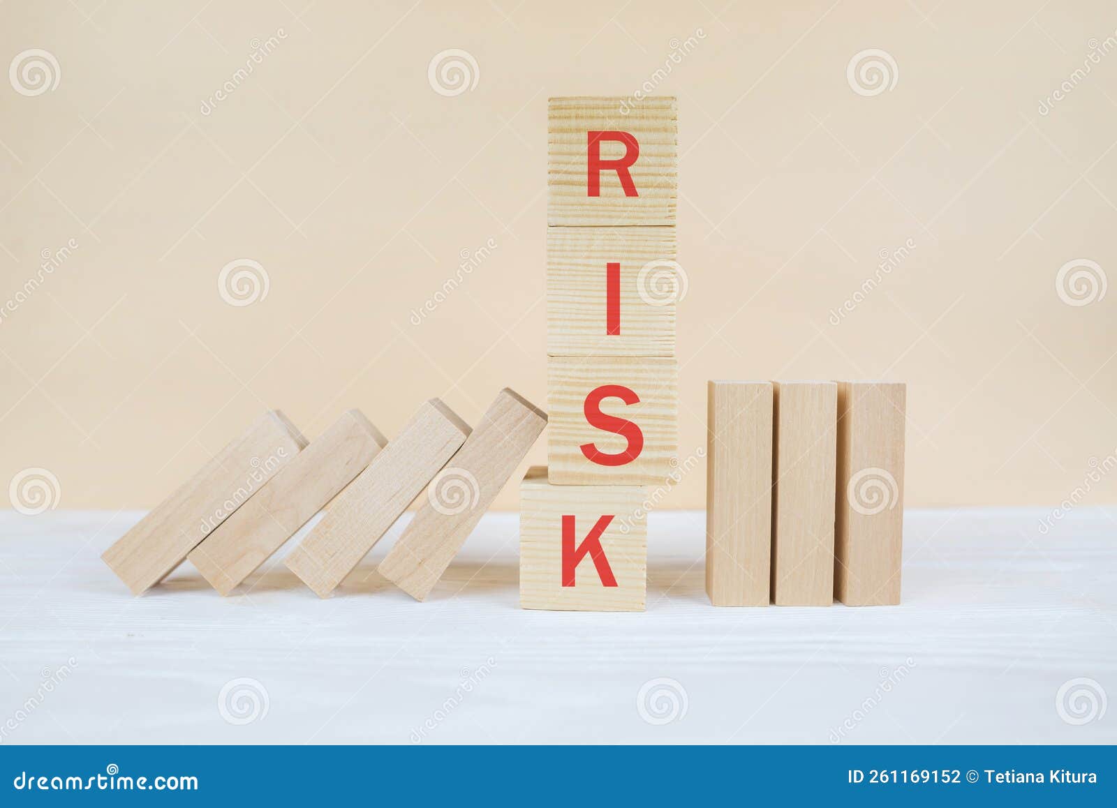 Red RISK Cube Blocks Stop Falling Blocks on Table Stock Photo - Image ...